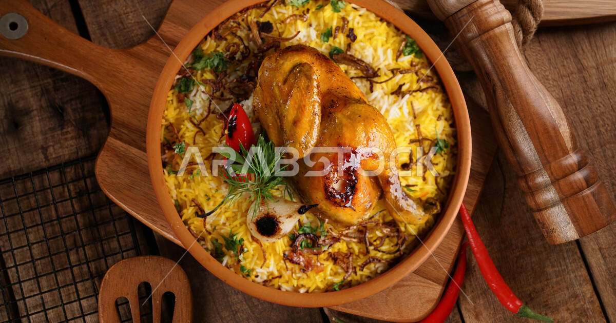 A plate of chicken kabsa rice, traditional Arab food, Arab food ...