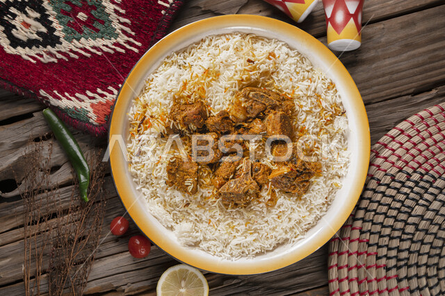 A dish of popular rice with meat, dazzling rice, traditional Arab ...
