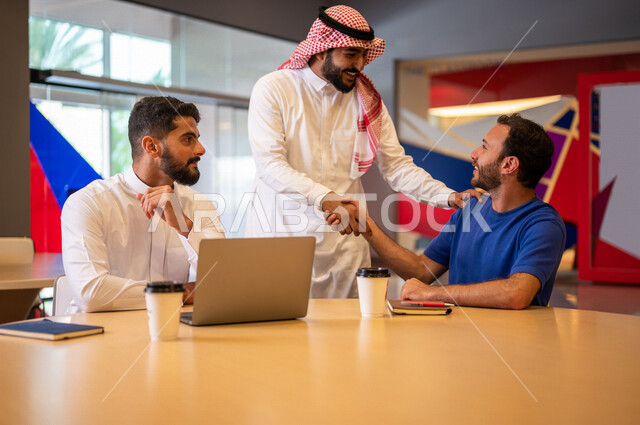 A close-up photo of a group of Arab Saudi Gulf university students in ...