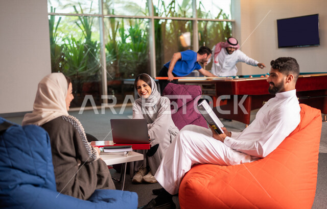 A group of Saudi Arabian Gulf university students at break time at the ...