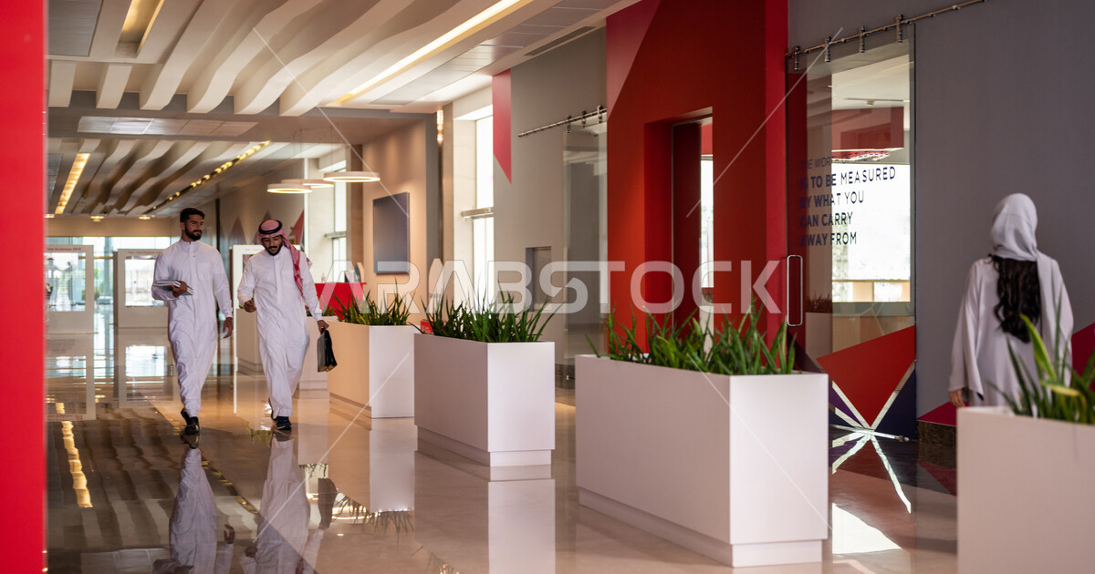 Arab Saudi Gulf university students in the university lobby, touring ...