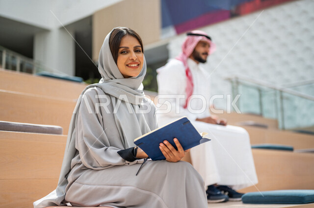Close-up picture of Saudi Arab Gulf university students in the lecture hall at the university ...