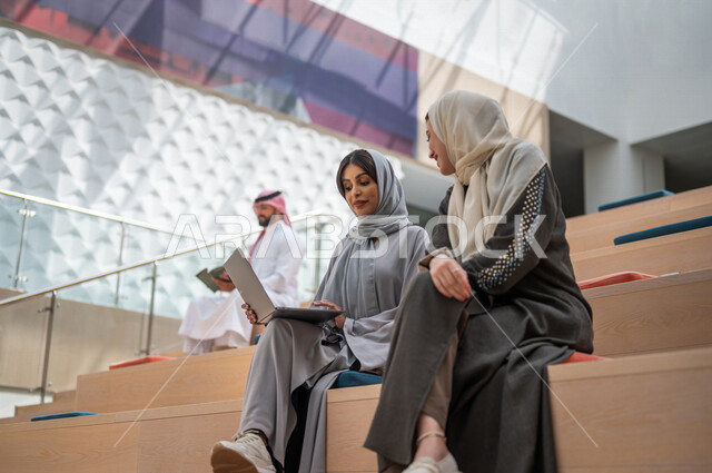 A close-up of Saudi Gulf Arab university students at the university, an ...