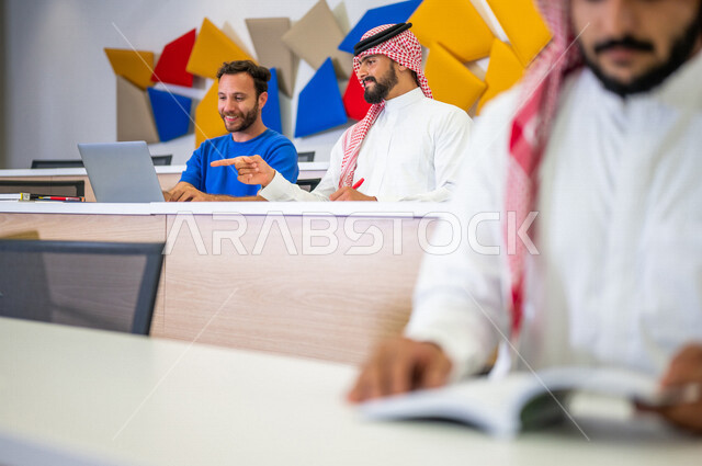 Close-up picture of Arab Saudi Gulf university students in the lecture hall at the university ...