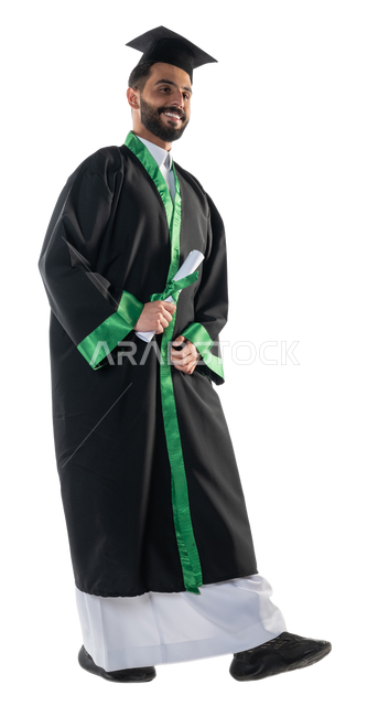 Portrait of a Saudi Arabian Gulf student wearing a gown and graduation ...