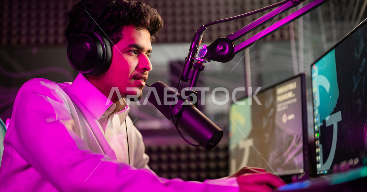 A young Saudi Arabian Gulf teenager in an electronic game store ...