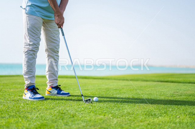 A close-up of a Saudi Arabian Gulf man wearing a sports uniform ...