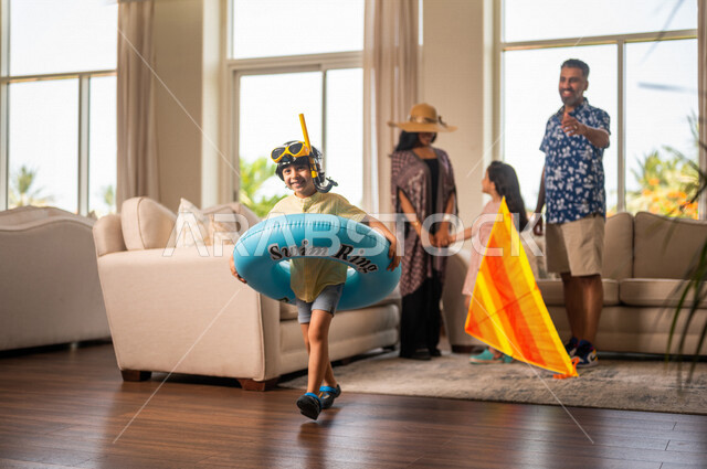 A Saudi Arabian Gulf family in a luxurious hotel room, a tourist resort ...