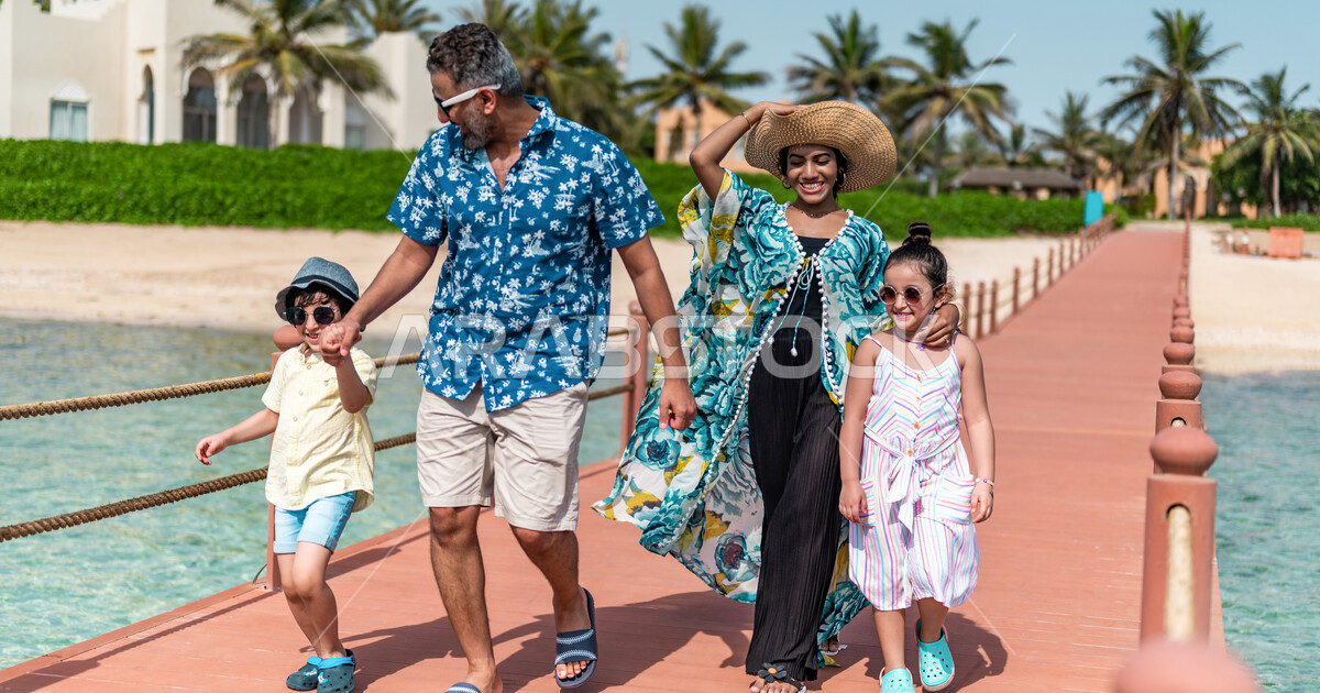 A Saudi Arabian Gulf family on a fun summer trip, summer vacation ...
