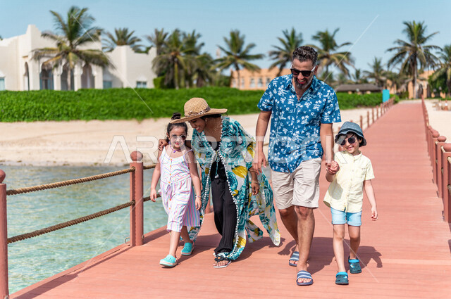 A Saudi Arabian Gulf family on a fun summer trip, summer vacation ...