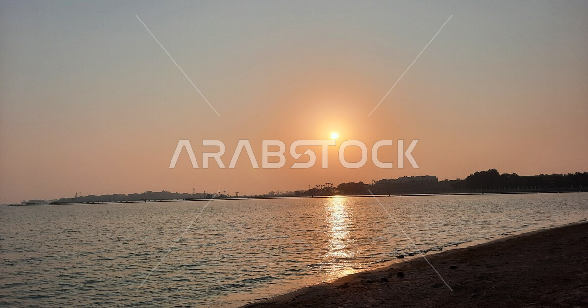 A view of the Jeddah Corniche at sunset, the Red Sea beach in the city ...