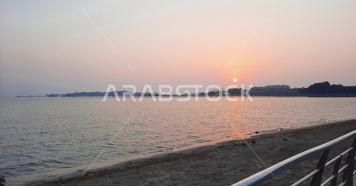 A view of the Jeddah Corniche at sunset, the Red Sea beach in the city ...