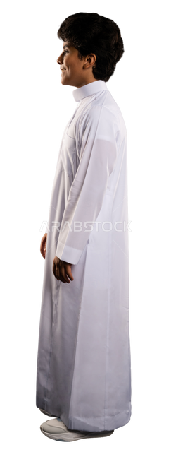 Portrait from the side of a Saudi Arabian Gulf boy wearing the Saudi ...
