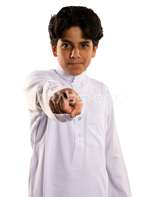 Portrait of a Saudi Arabian Gulf boy wearing a Saudi dress, facial and ...