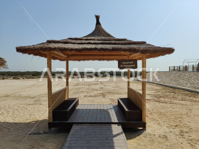 Close-up of a large canopy and seating in the mangrove park in Ras ...