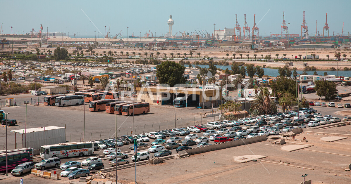 Cars and buses in the port of Jeddah in the Kingdom of Saudi Arabia ...