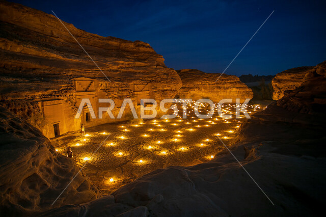 A group of luminous candles in front of the Flying Museum in Al-Ula ...