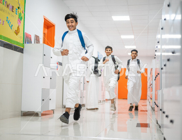 A group of Saudi Gulf Arab students wandering around the school ...