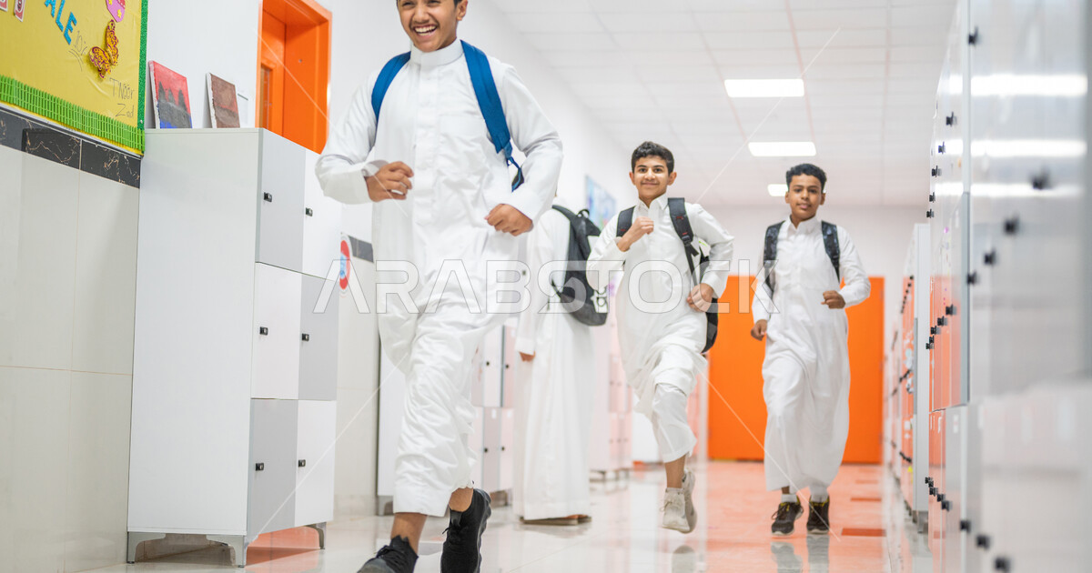 A group of Saudi Gulf Arab students wandering around the school ...