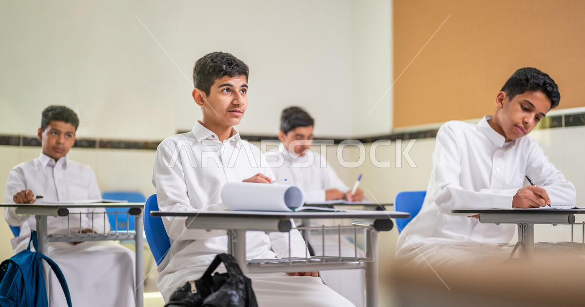 A close-up of a Saudi Arabian Gulf student with facial gestures ...