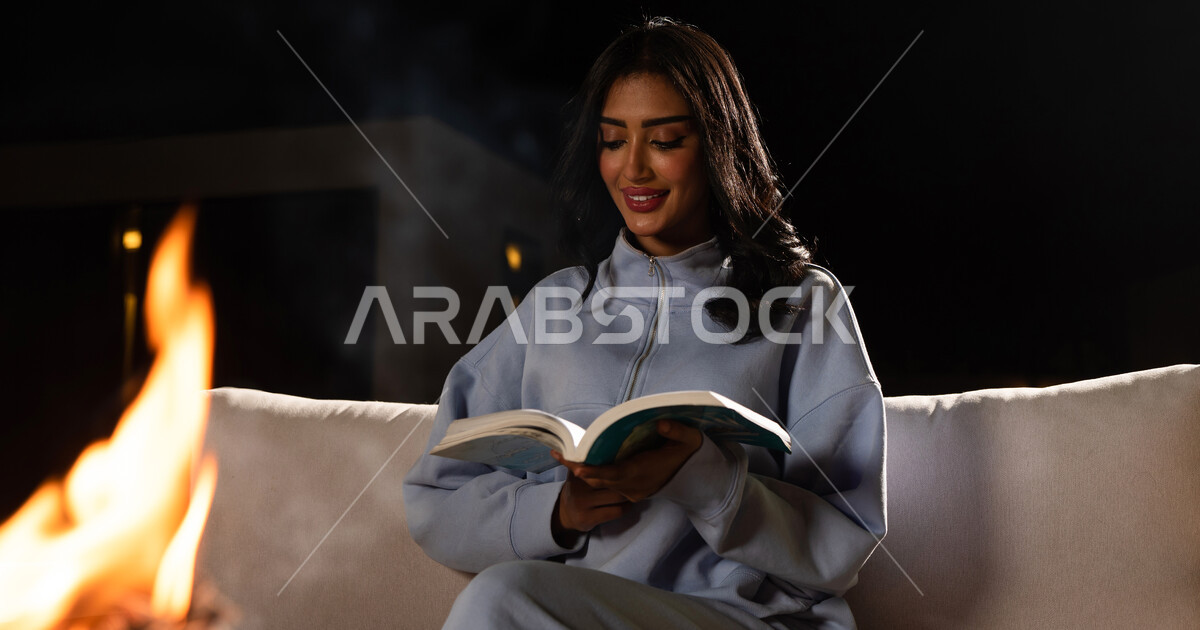 A Saudi Arabian Gulf woman sitting in one of the tourist chalets in ...