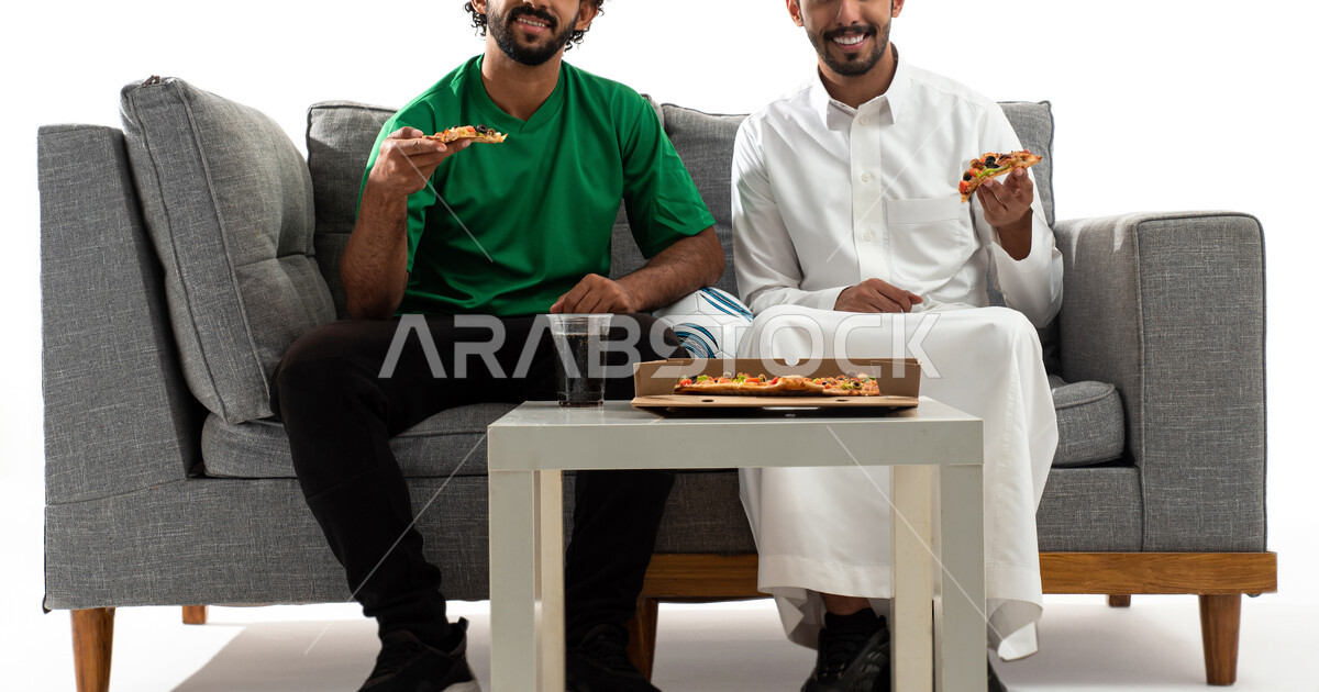 Portrait of two Saudi Arabian Gulf youths cheering for the Saudi ...