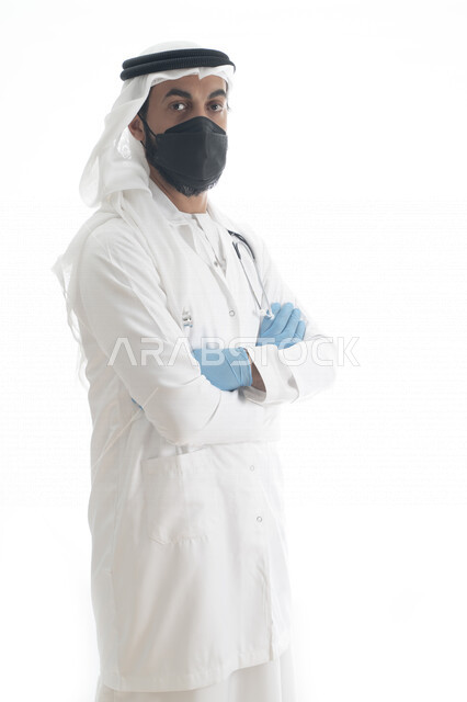 Portrait of an Arab Emirati Gulf doctor in traditional attire wearing a ...