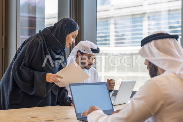Arab-Emirati-Gulf work team in a business meeting inside the company's ...