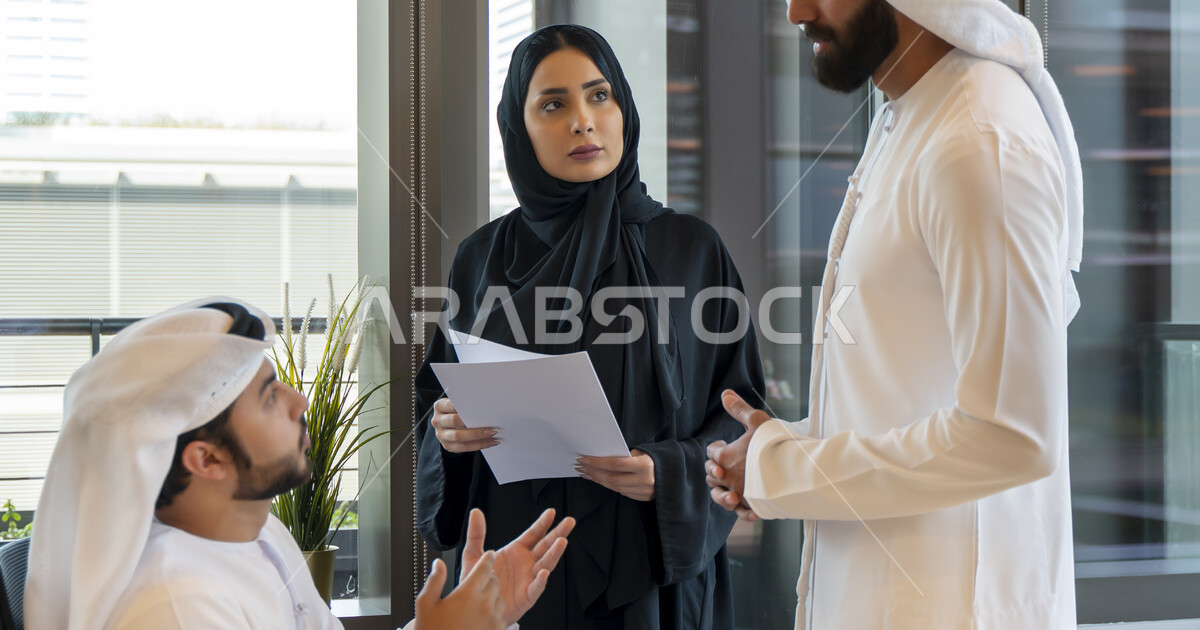 Arab-Emirati-Gulf work team in a business meeting inside the company's ...