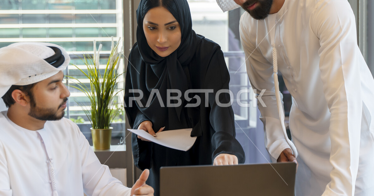 Arab-Emirati-Gulf work team in a business meeting inside the company's ...