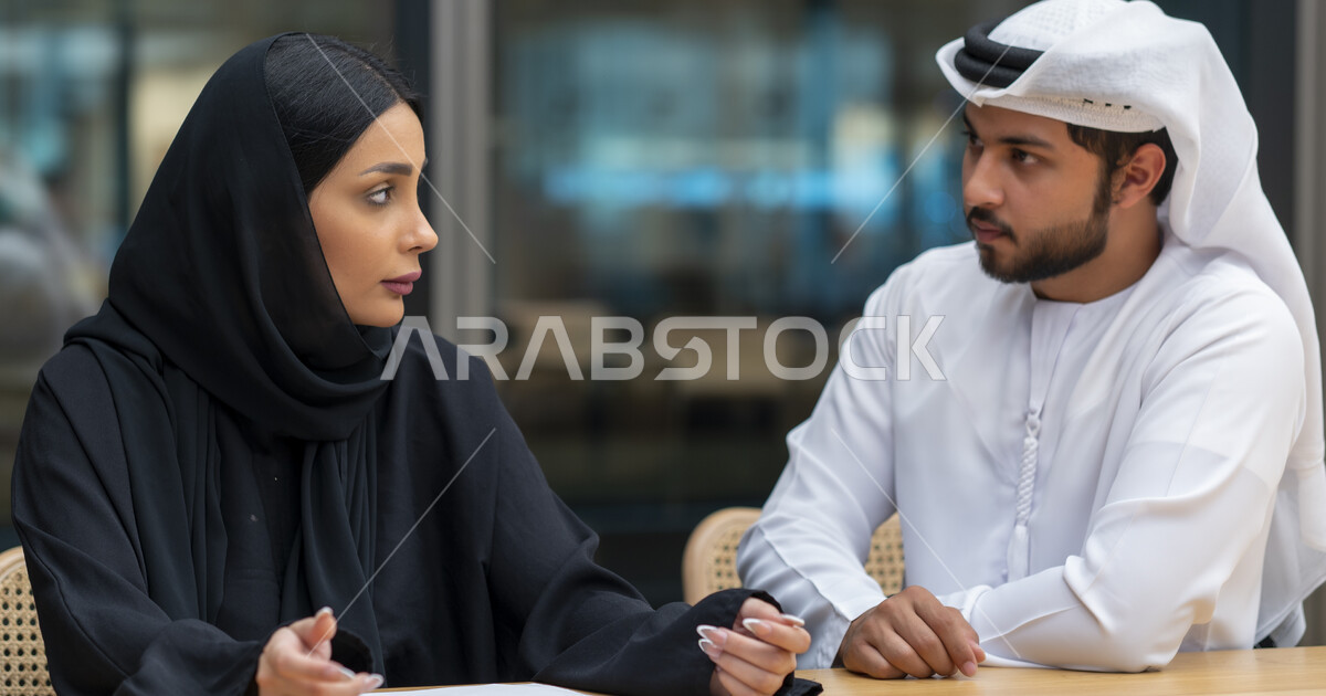 Arab-Emirati-Gulf work team in a business meeting inside the company's ...