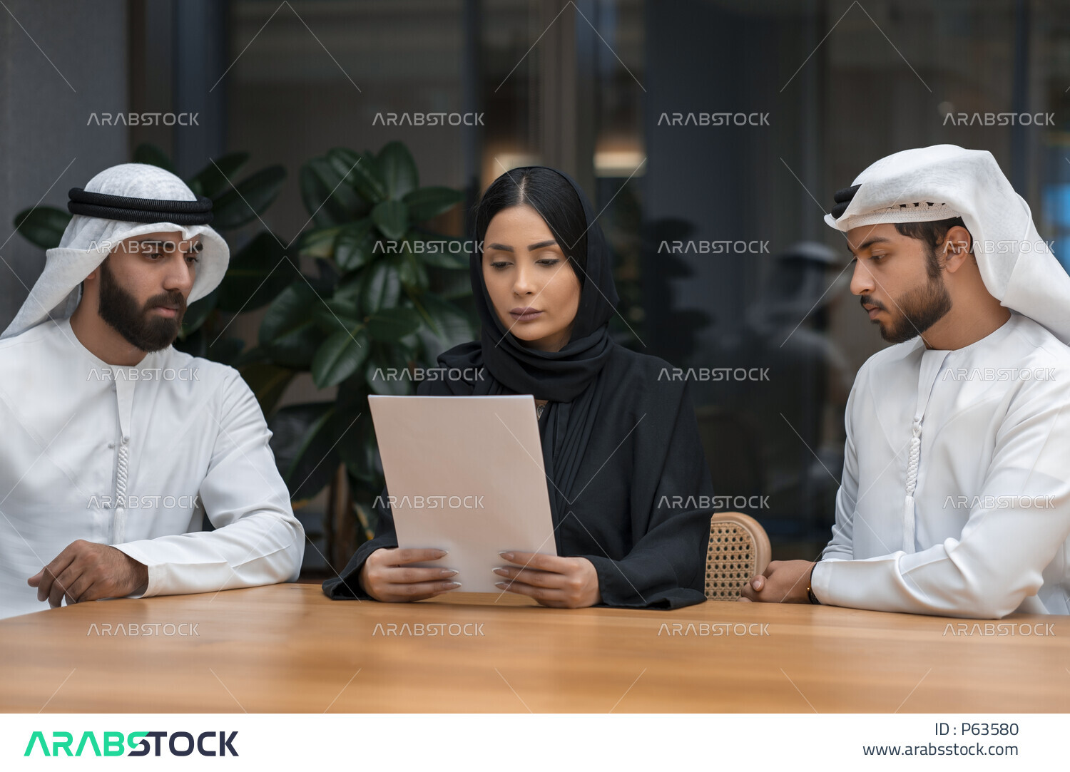 Arab-Emirati-Gulf work team in a business meeting inside the company's ...