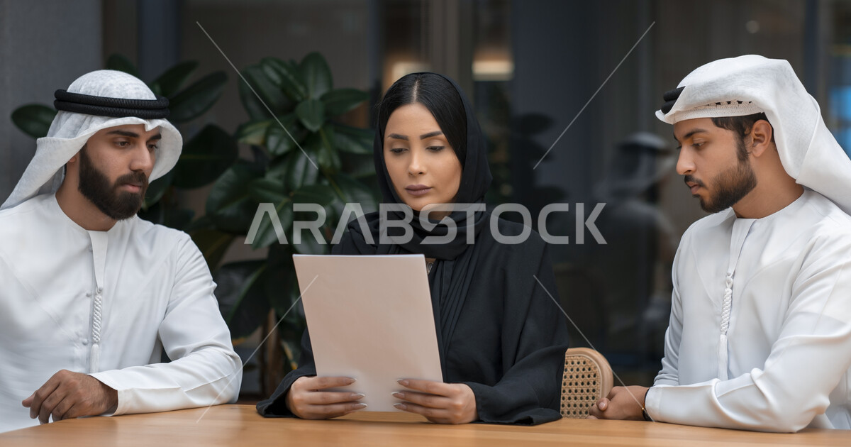 Arab-Emirati-Gulf work team in a business meeting inside the company's ...