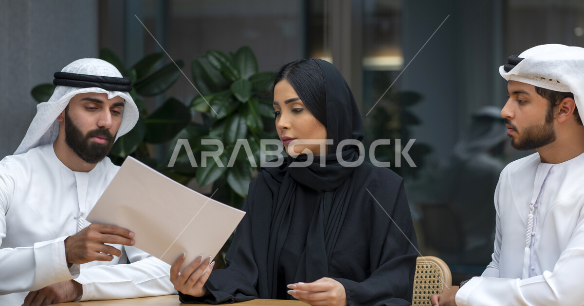 Arab-Emirati-Gulf work team in a business meeting inside the company's ...