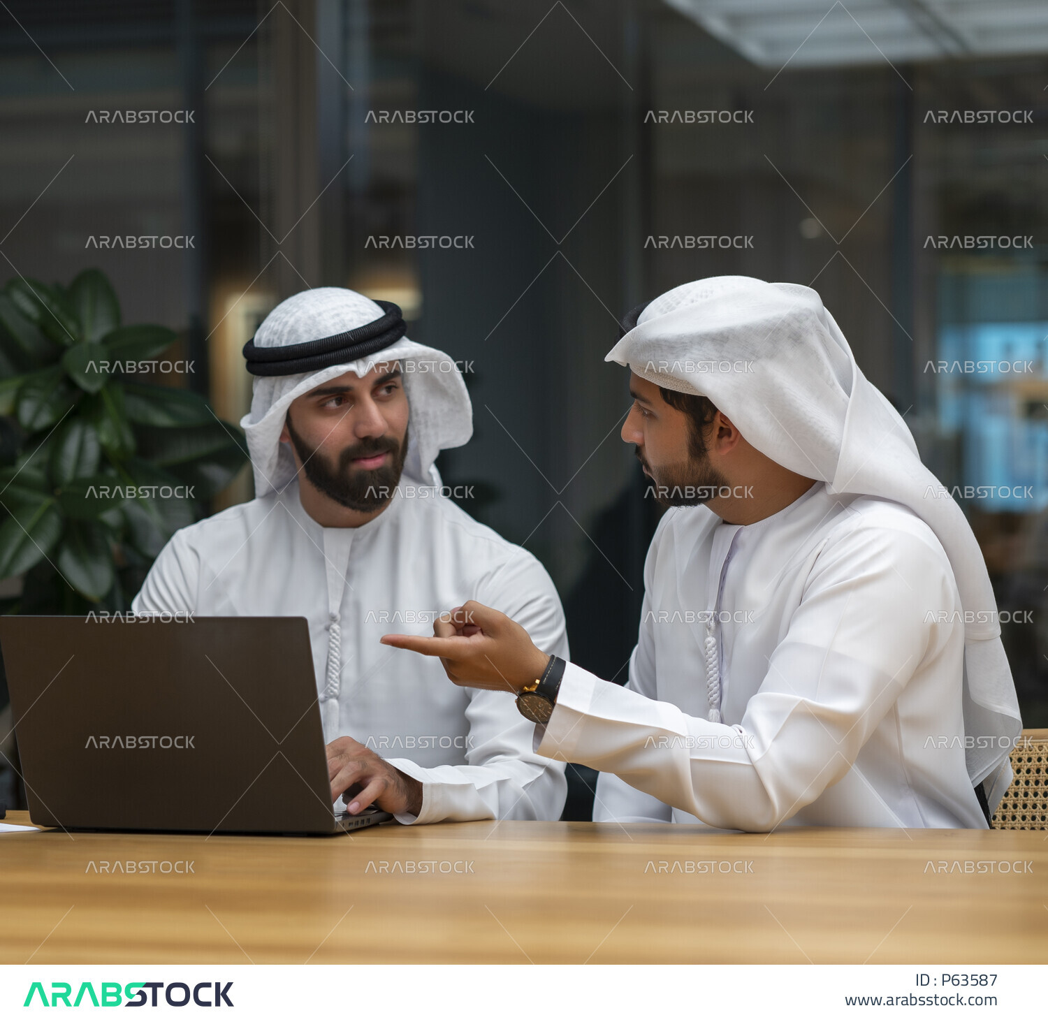 Arab-Emirati-Gulf work team in a business meeting inside the company's ...