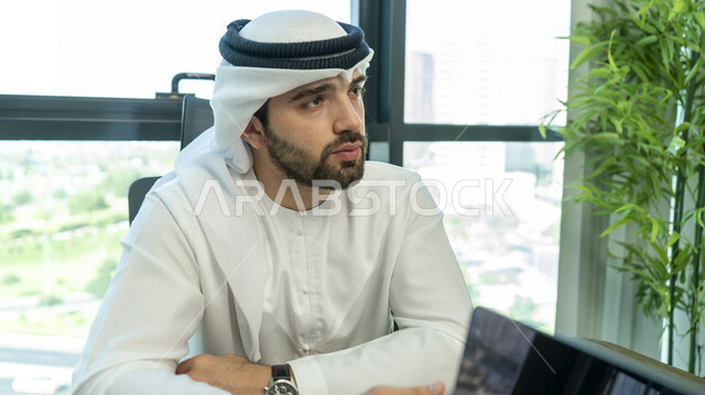 A close-up of an Arab Gulf Emirati businessman at the company's ...