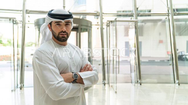 Emirati Gulf Arab businessman wearing traditional Emirati dress and ...