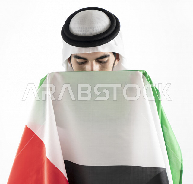 Portrait of an Emirati Arab Gulf man, in traditional Emirati dress ...