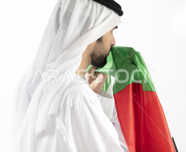 Portrait of an Emirati Arab Gulf man, in traditional Emirati dress ...