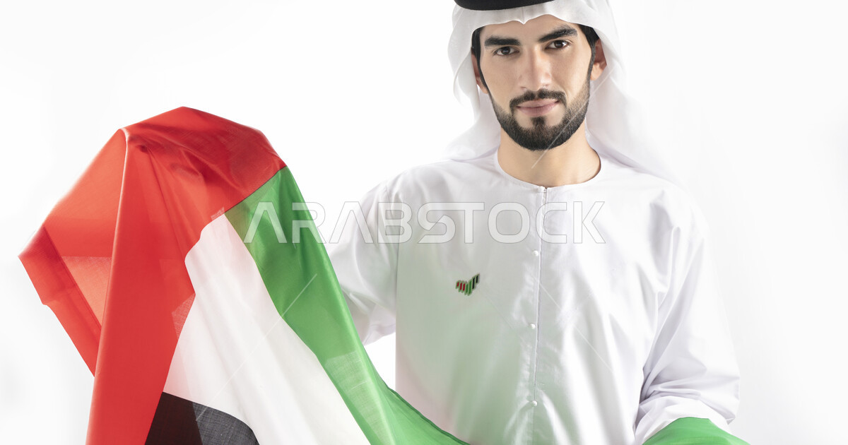 Portrait of an Emirati Arab Gulf man, wearing traditional Emirati dress ...