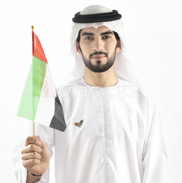 Portrait of an Emirati Arab Gulf man, wearing traditional Emirati dress ...