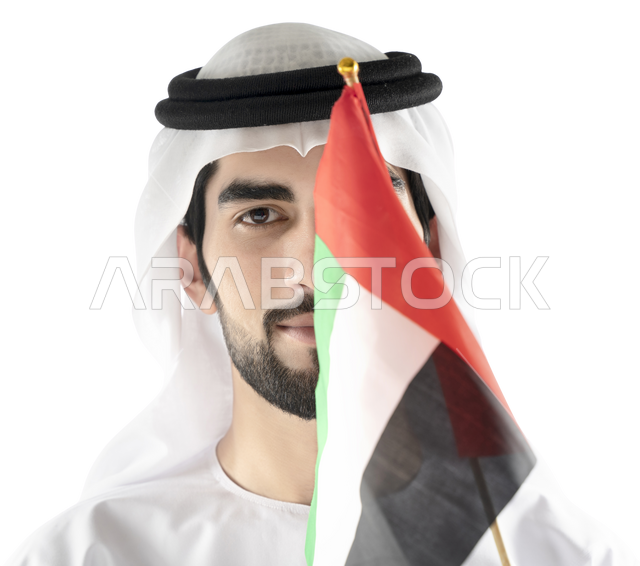 Portrait of a close-up of an Emirati Arab Gulf man, wearing traditional ...