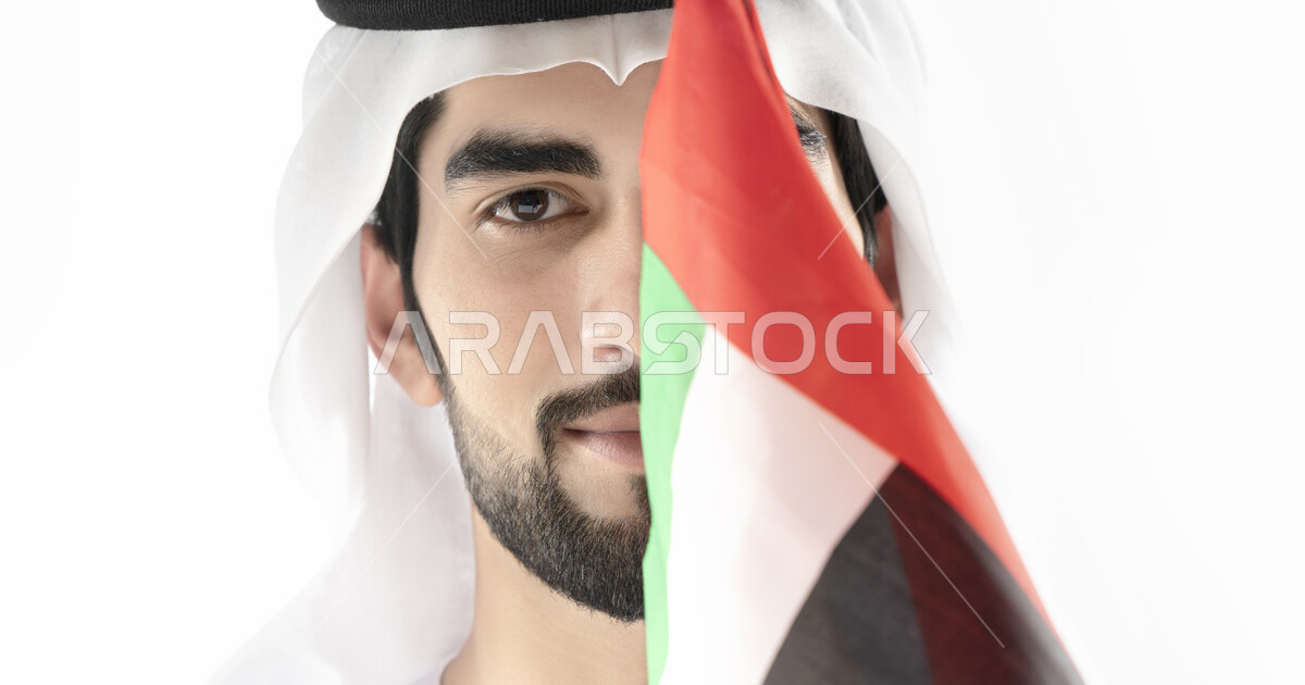 Portrait of a close-up of an Emirati Arab Gulf man, wearing traditional ...