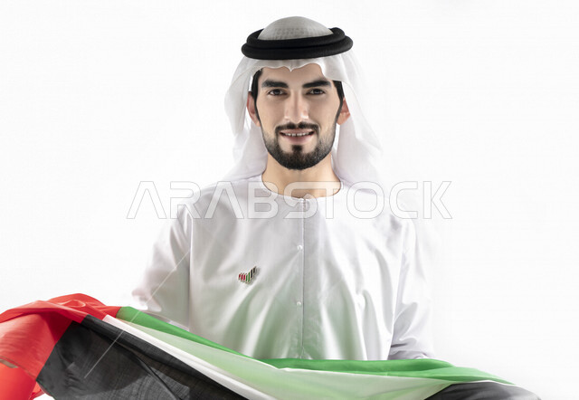 Portrait of an Emirati Arab Gulf man, wearing traditional Emirati dress ...