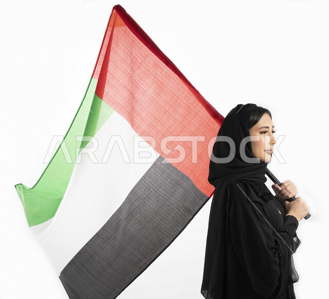 Portrait at an angle from the side of an Emirati Arab Gulf woman ...