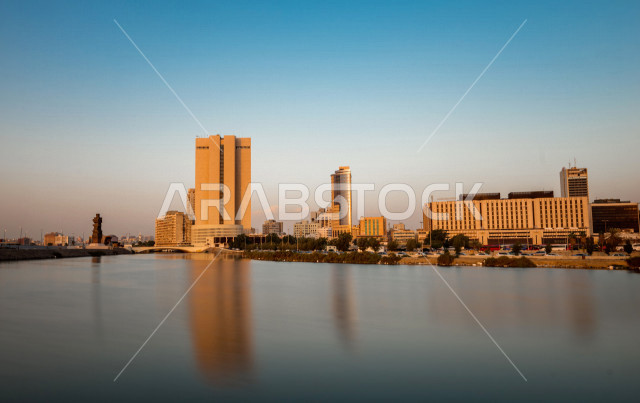Towers and buildings of the city of Jeddah overlooking the sea, a ...