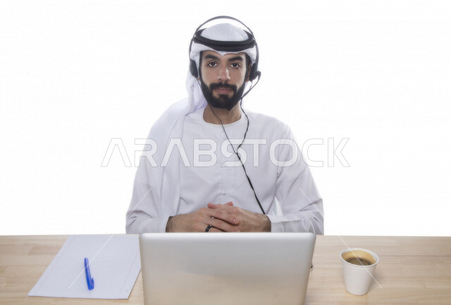 Portrait of an Arab Gulf Emirati employee working in customer service ...