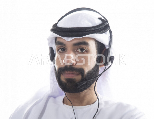 Portrait of an Arab Gulf Emirati employee working in customer service ...