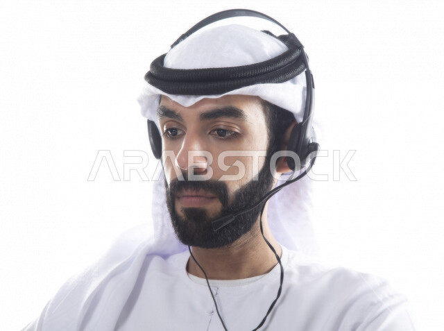 Portrait of an Arab Gulf Emirati employee working in customer service ...