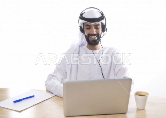 Portrait of an Arab Gulf Emirati employee working in customer service ...